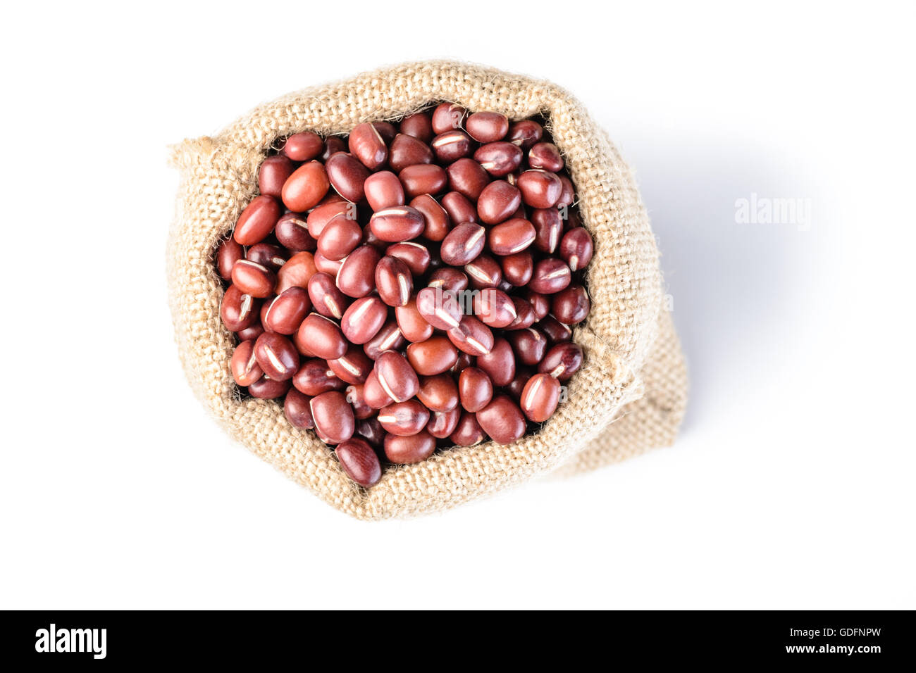 red beans in the sack on the white background Stock Photo - Alamy