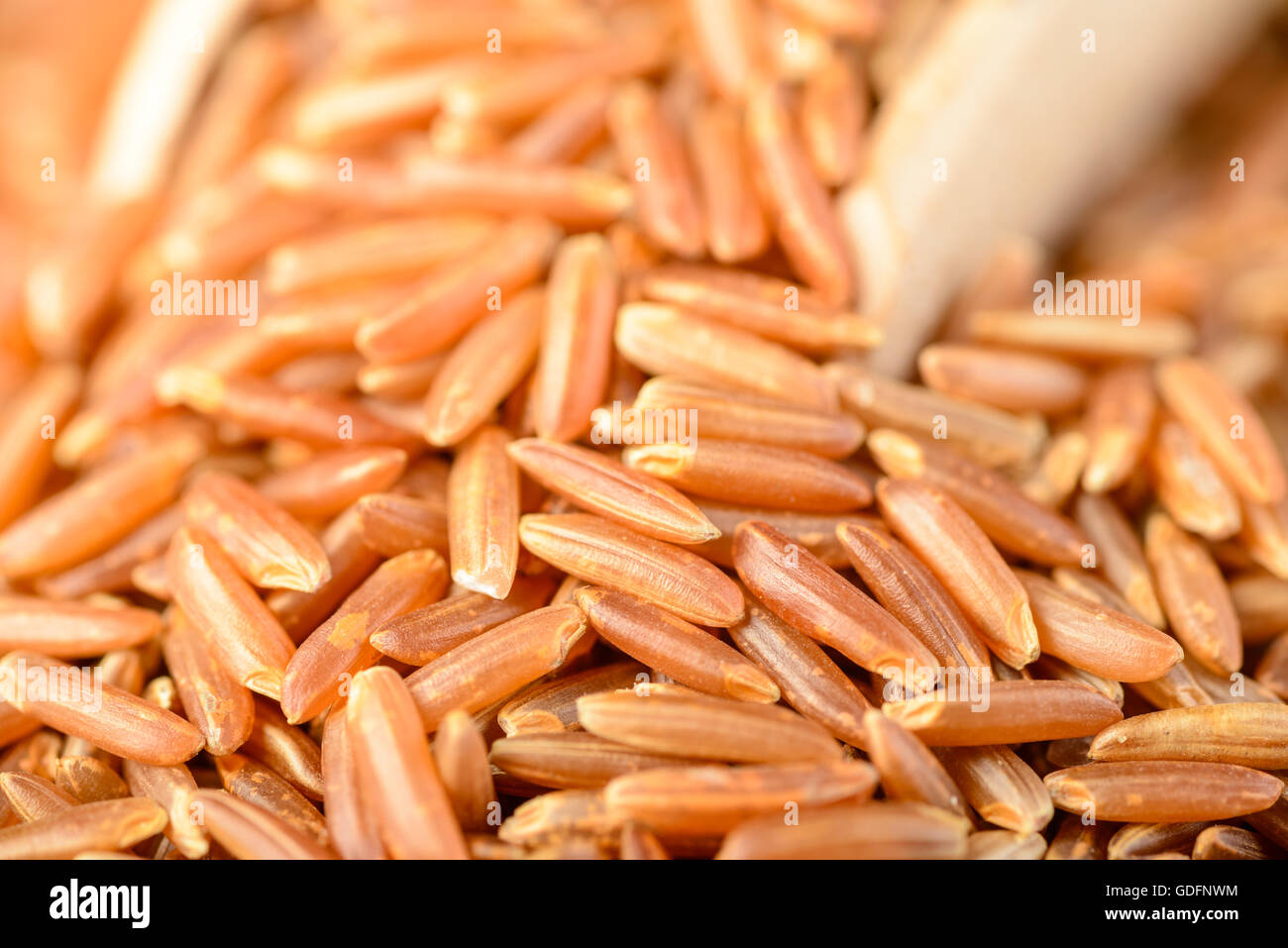 Red rice with wooden shovel hi-res stock photography and images - Alamy