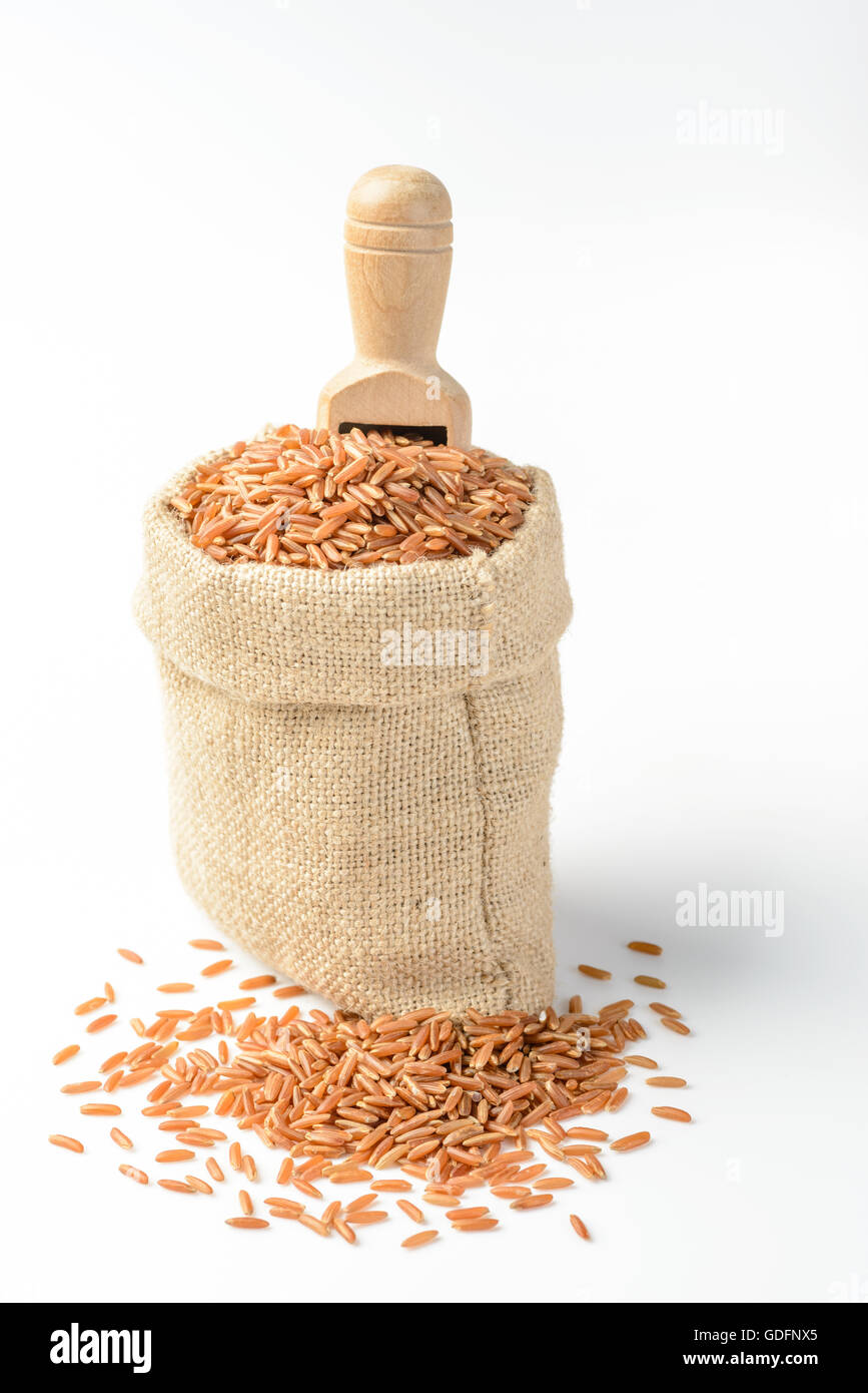 Red rice with wooden shovel hi-res stock photography and images - Alamy