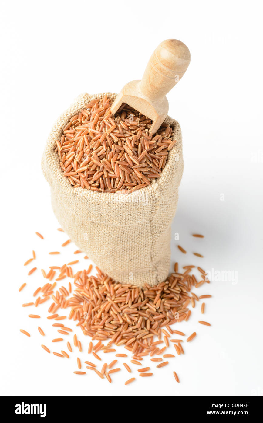 Red rice with wooden shovel hi-res stock photography and images - Alamy