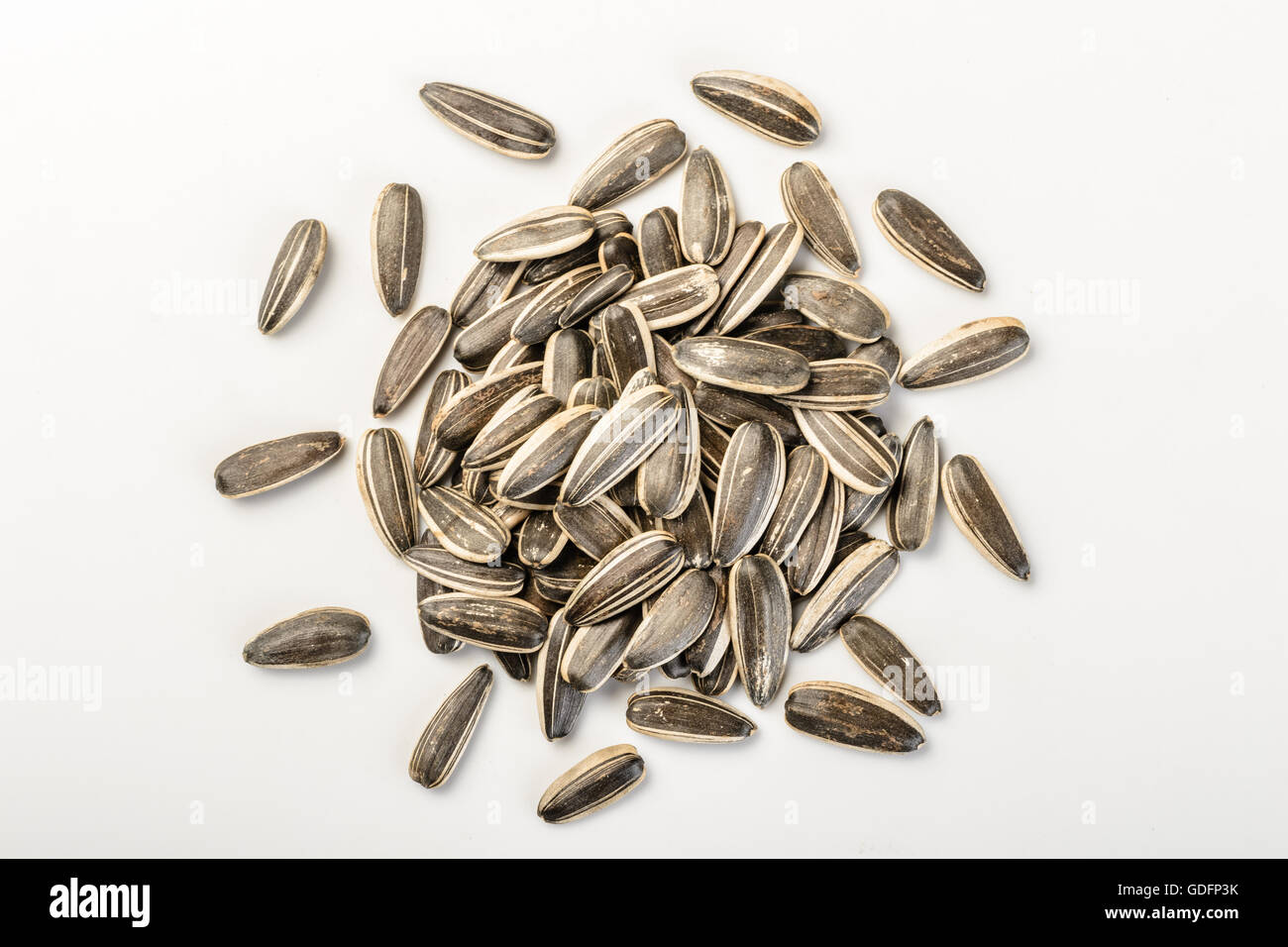 baked sunflower seeds on the white background Stock Photo - Alamy