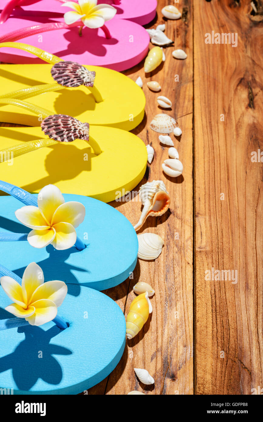 Yellow flip flops frangipani flower hi-res stock photography and images ...