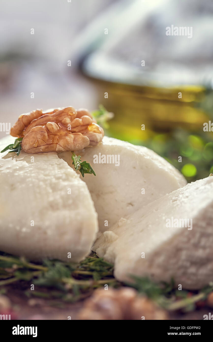 Goat cheese with honey, thyme and nuts Stock Photo - Alamy