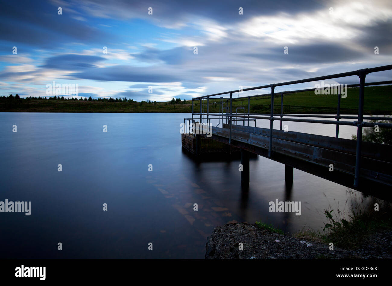 Photograph by © Jamie Callister. Sunset at the Llyn Bran, Denbigh Moors ...