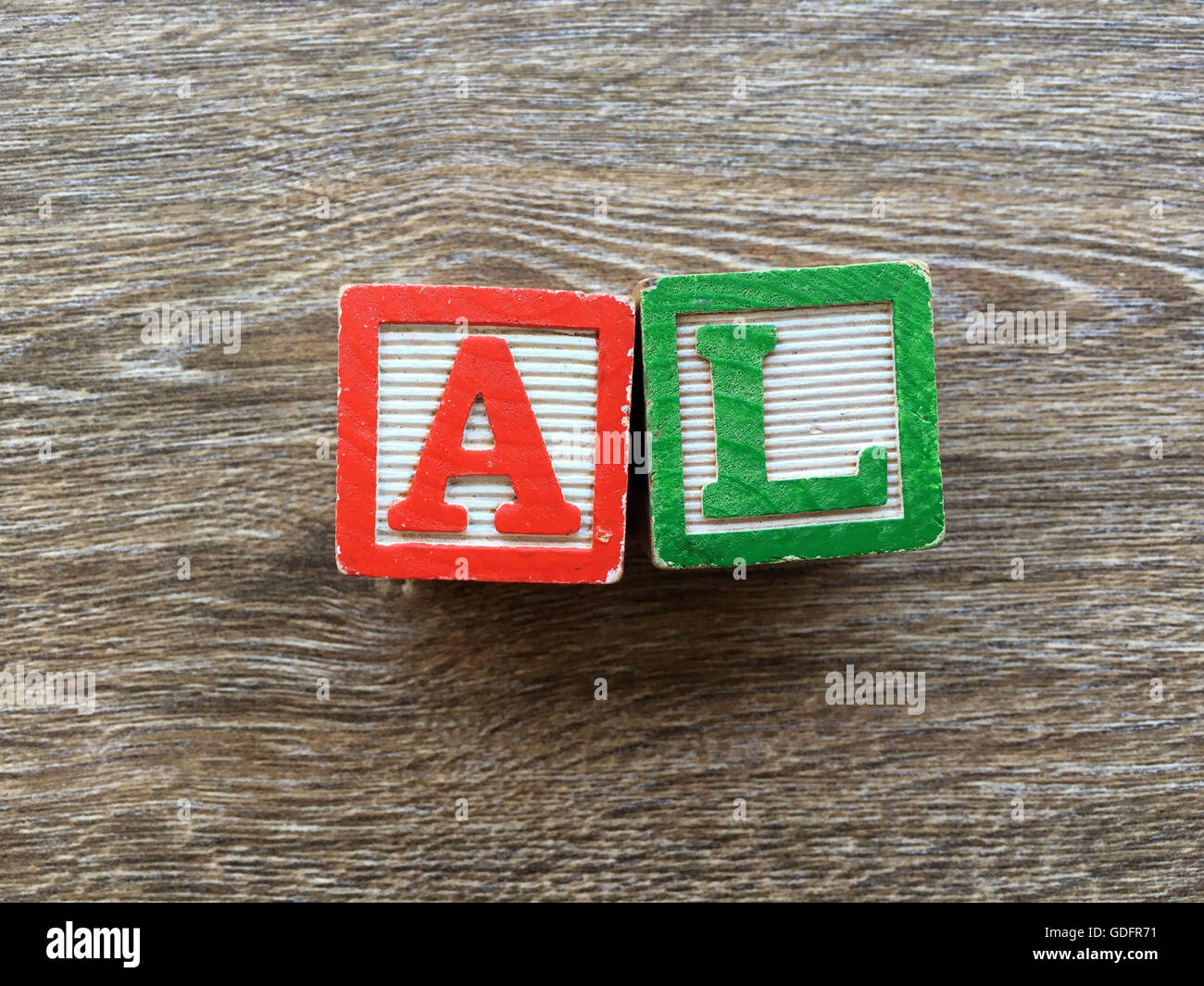 Al name written with wood block letter toys Stock Photo - Alamy