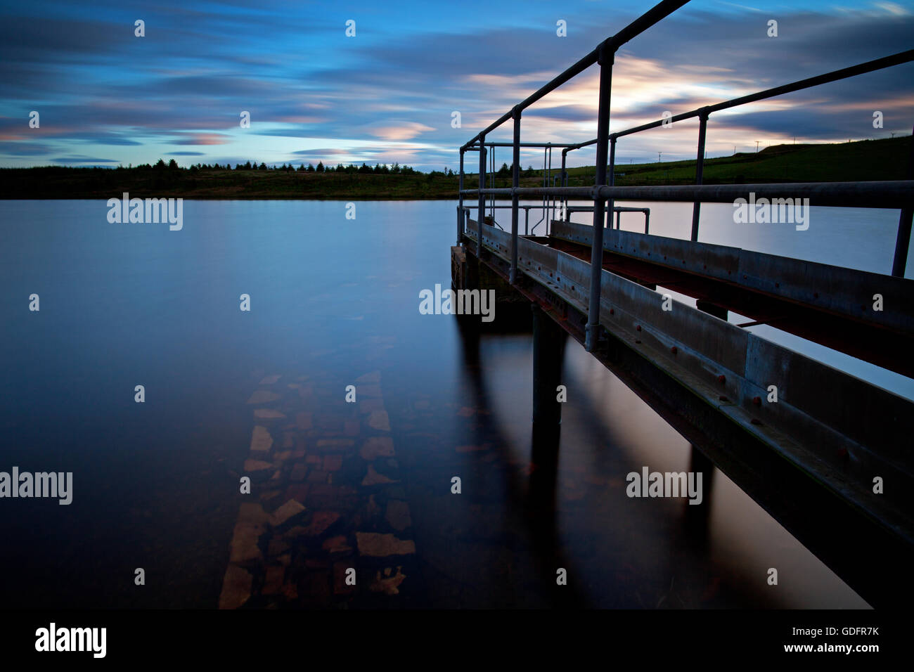 Photograph by © Jamie Callister. Sunset at the Llyn Bran, Denbigh Moors ...