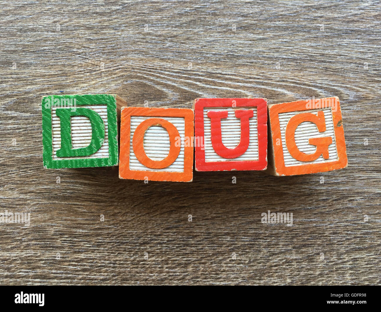 Doug name written with wood block letter toys Stock Photo - Alamy