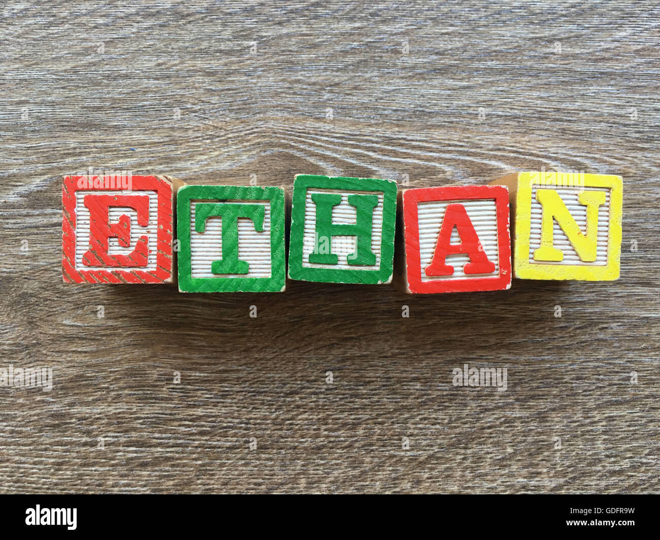 Ethan name written with wood block letter toys Stock Photo - Alamy