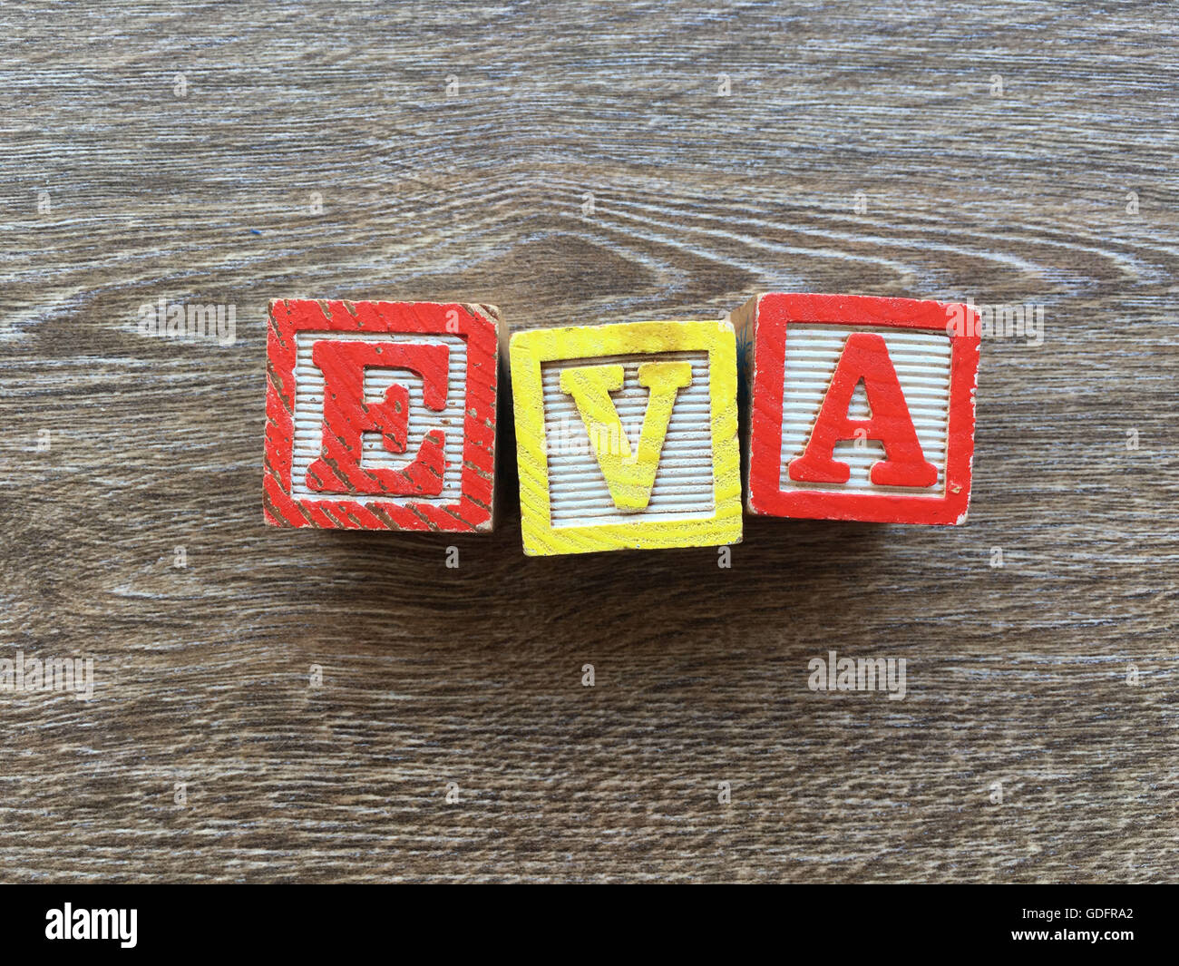 Eva name written with wood block letter toys Stock Photo - Alamy