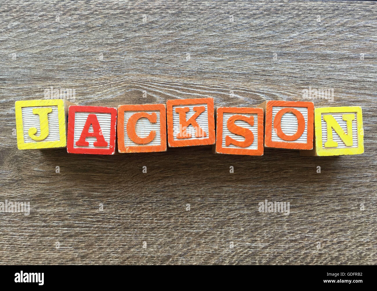 Jackson name written with wood block letter toys Stock Photo - Alamy