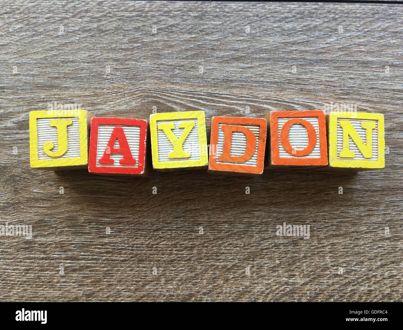 Jaydon name written with wood block letter toys Stock Photo - Alamy
