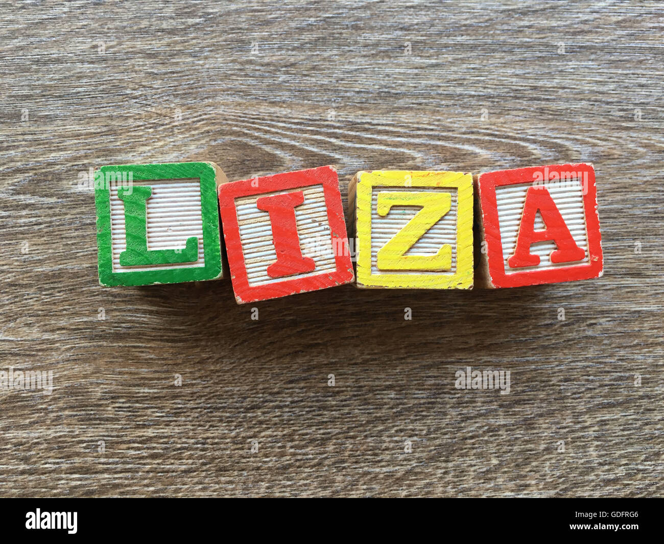 Liza name written with wood block letter toys Stock Photo - Alamy