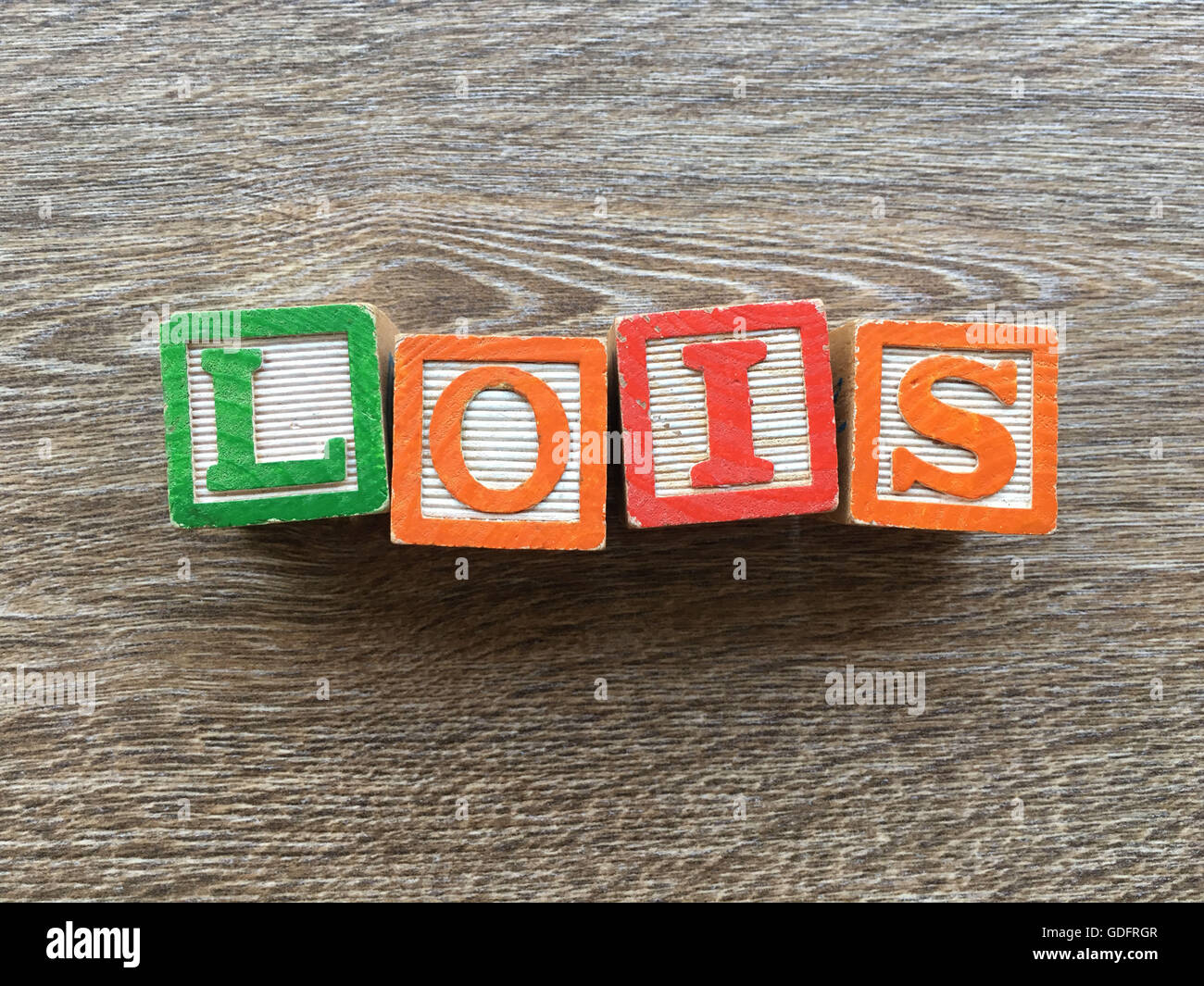 Lois name written with wood block letter toys Stock Photo - Alamy