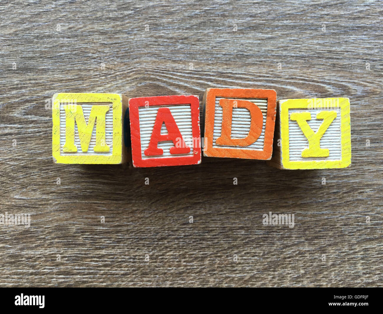 Mady name written with wood block letter toys Stock Photo - Alamy