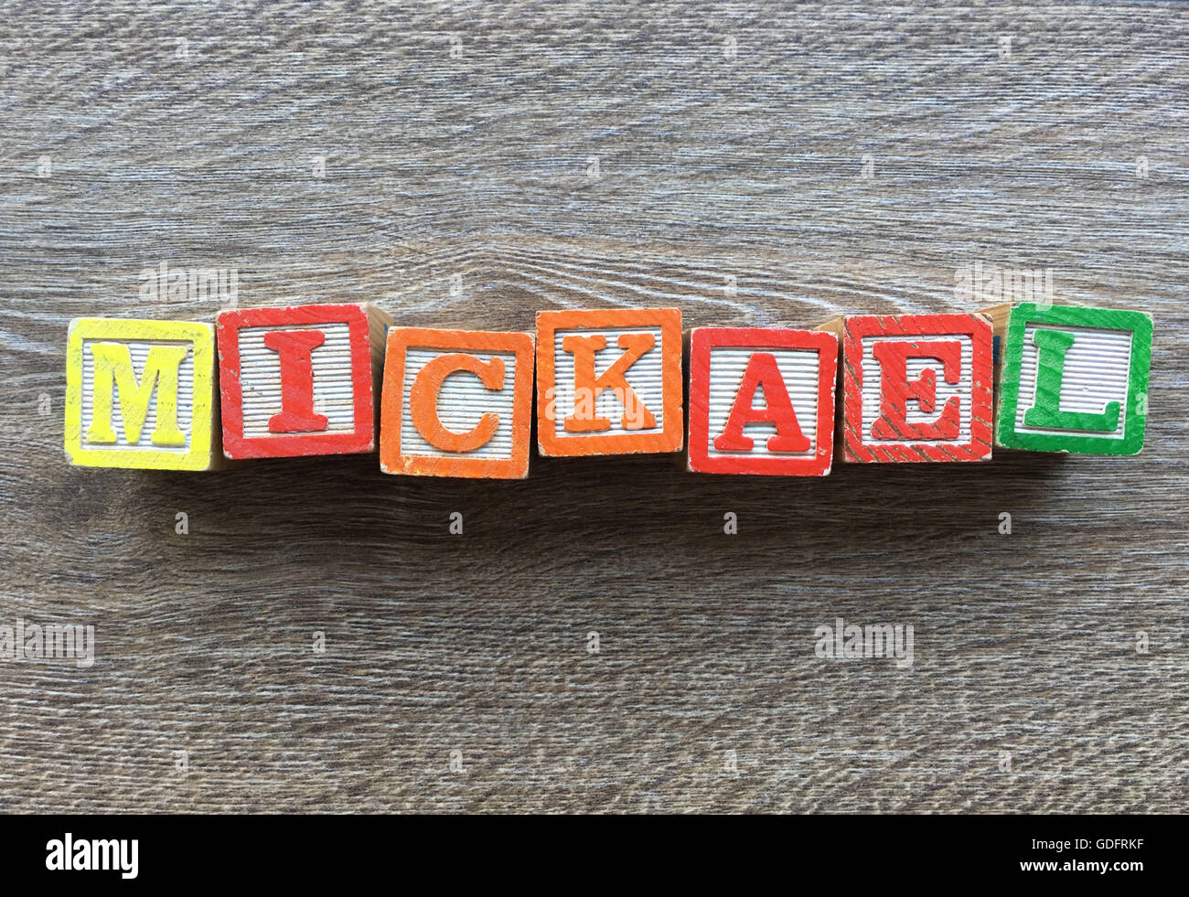 Mickael name written with wood block letter toys Stock Photo - Alamy