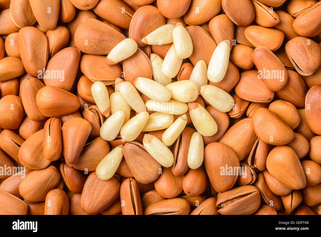 food background of pine nuts Stock Photo - Alamy