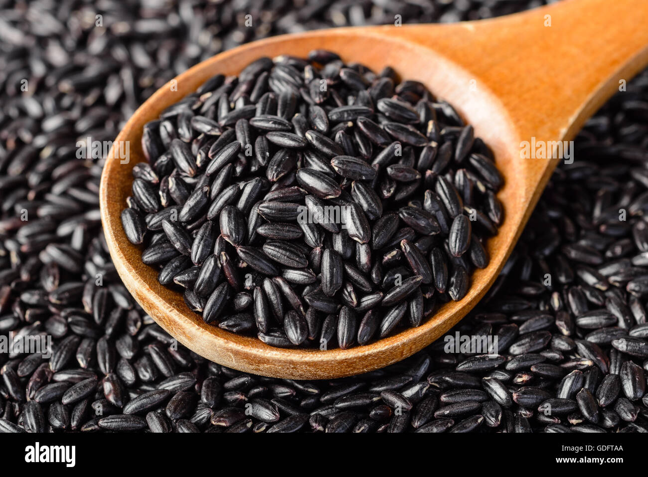 food background of black rice,tilt-shift lens Stock Photo - Alamy