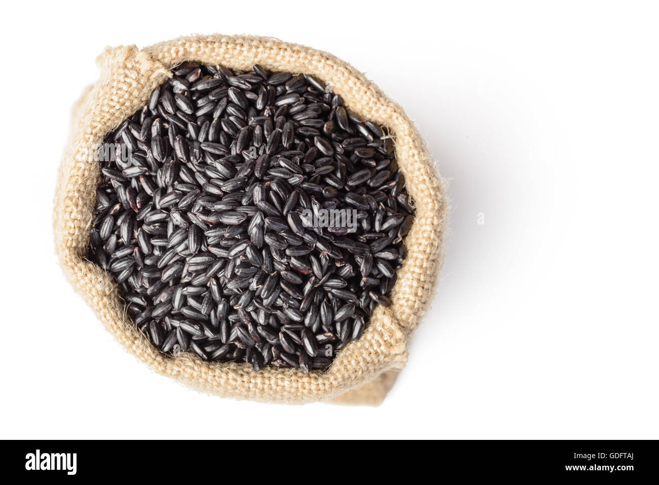 black rice on the white background, tilt shift lens Stock Photo - Alamy