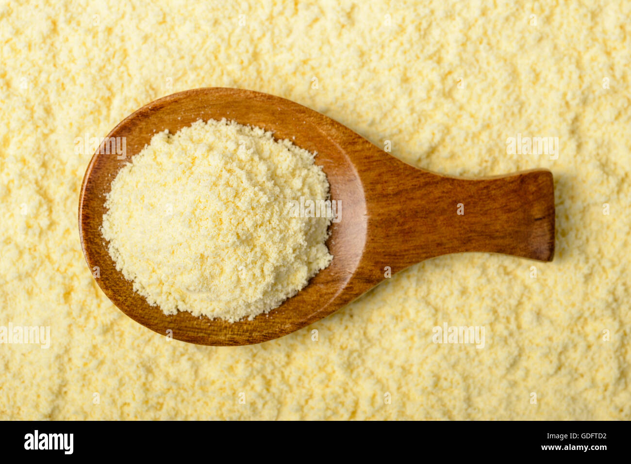 food background of raw corn flour, tilt shift lens Stock Photo - Alamy