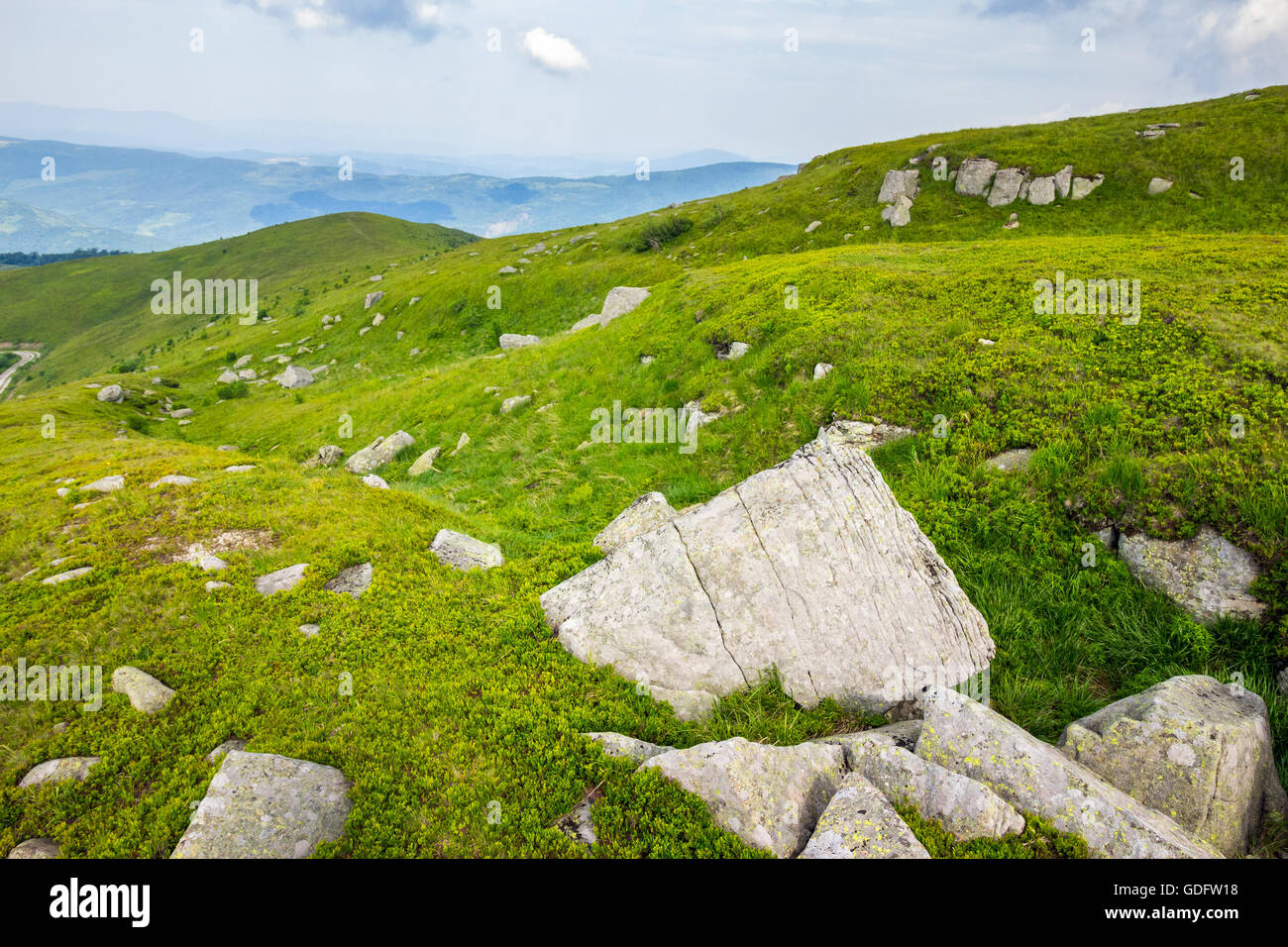 white sharp stones on the hillside on top of mountain range Stock Photo ...