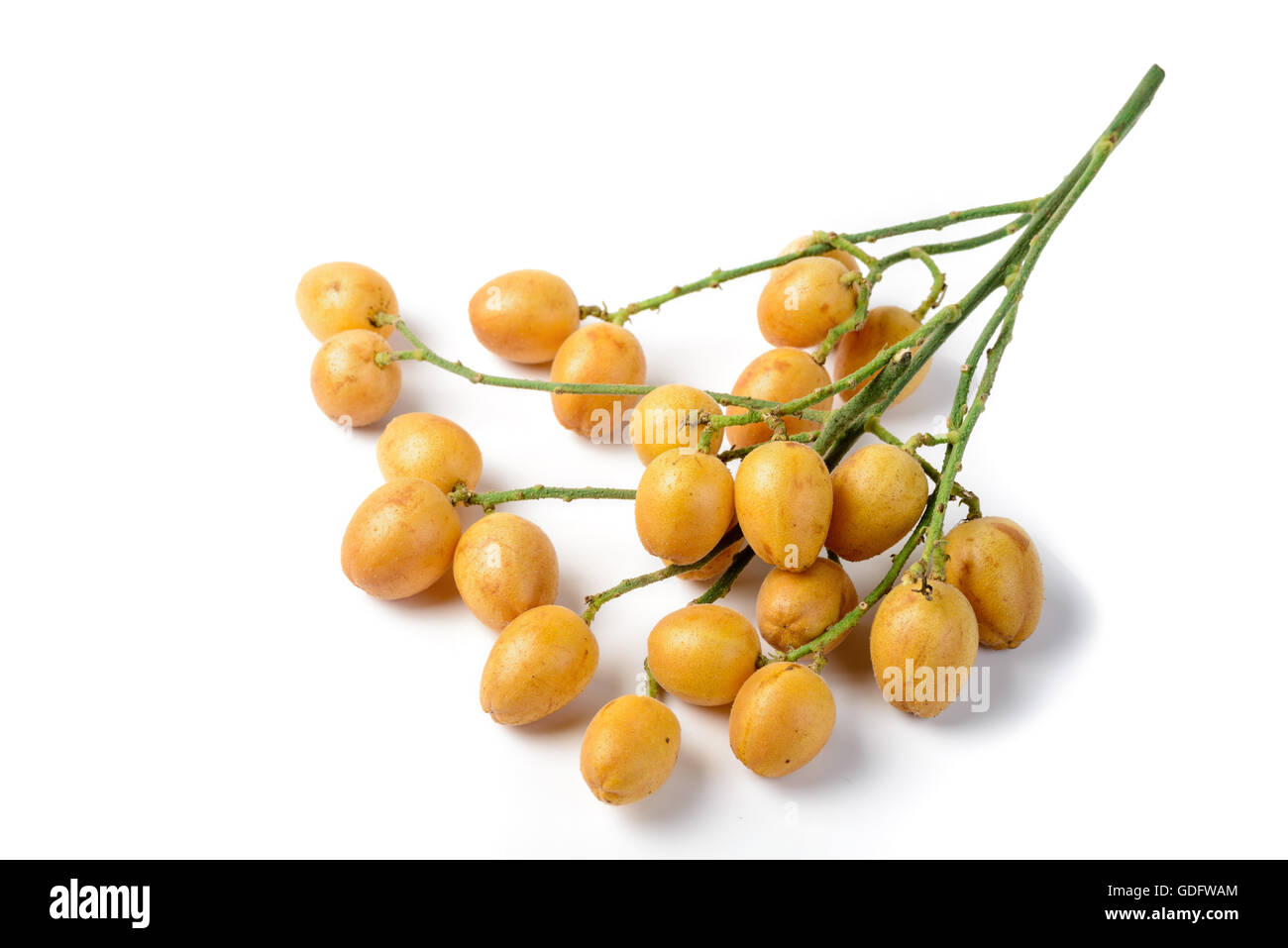 wampee fruit on the white background Stock Photo - Alamy