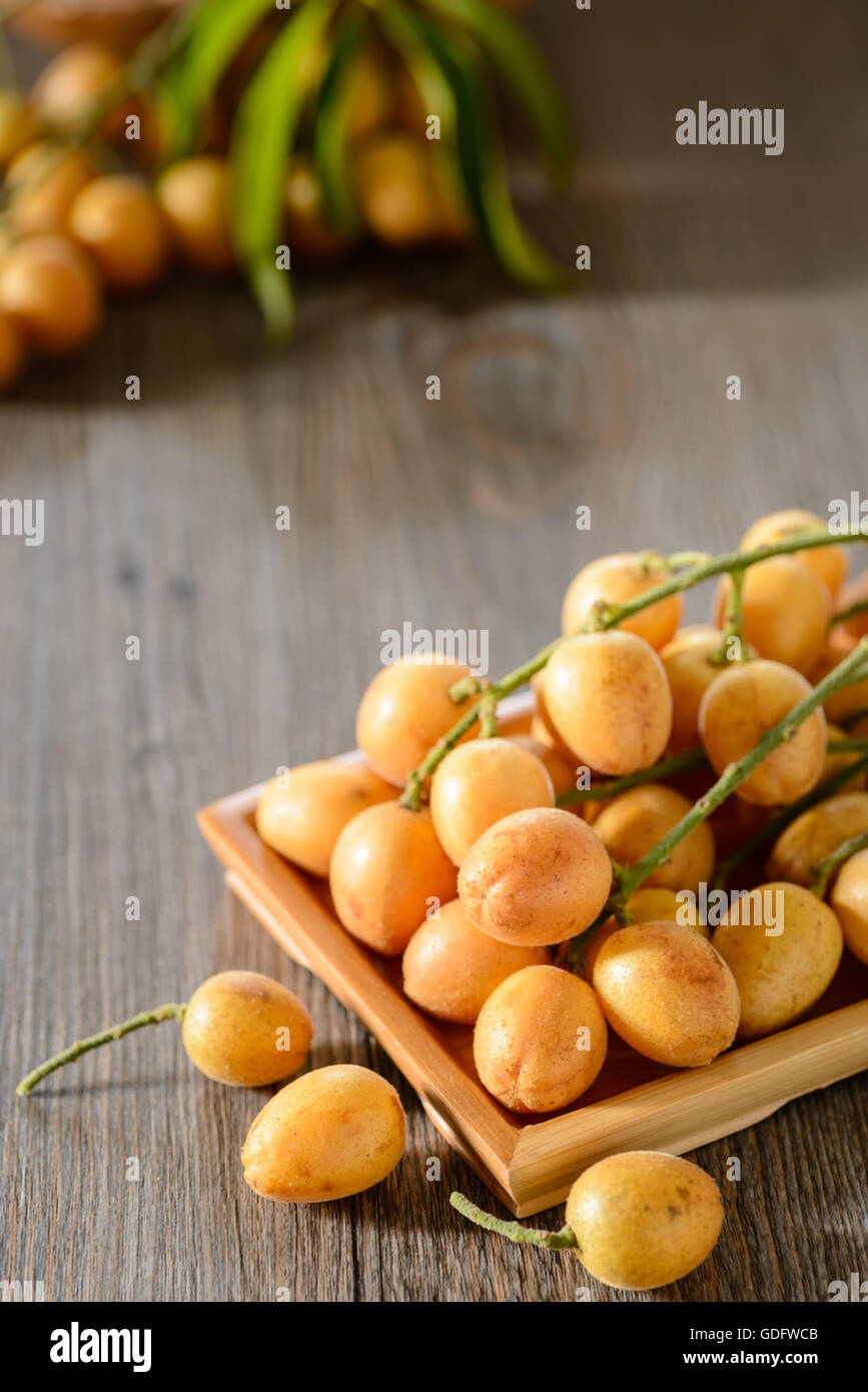 fresh wampee fruit Stock Photo - Alamy