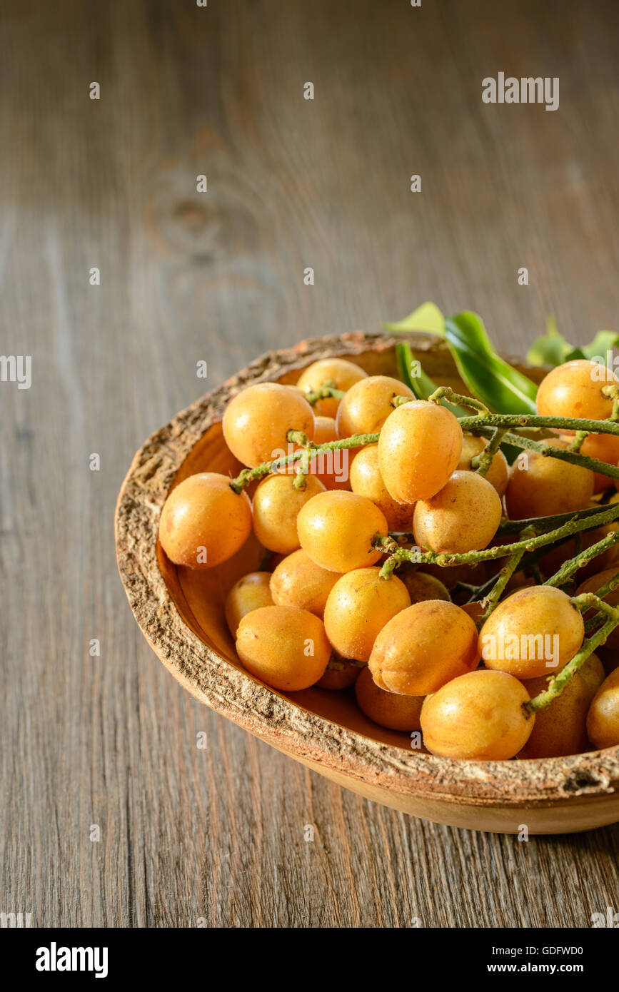 fresh wampee fruit Stock Photo - Alamy
