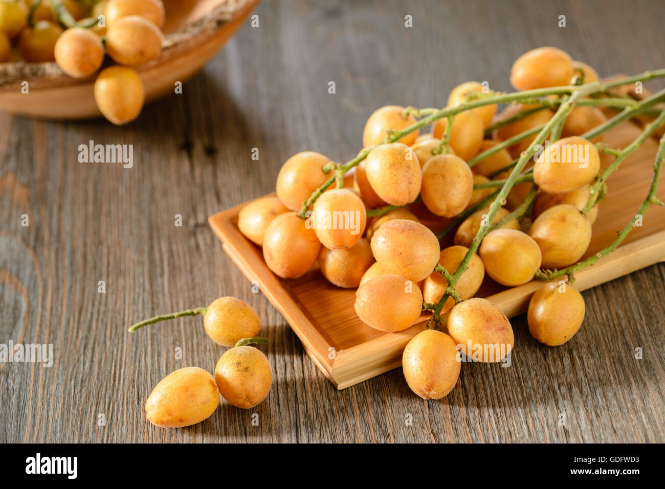 fresh wampee fruit Stock Photo - Alamy