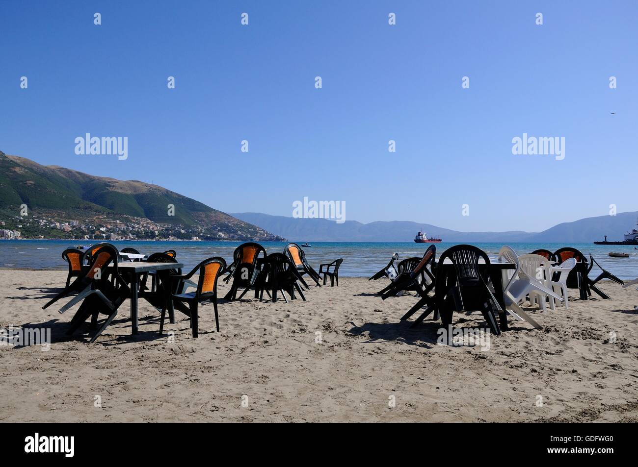 Chairs on the sand beach in Vlore, Albania Stock Photo - Alamy