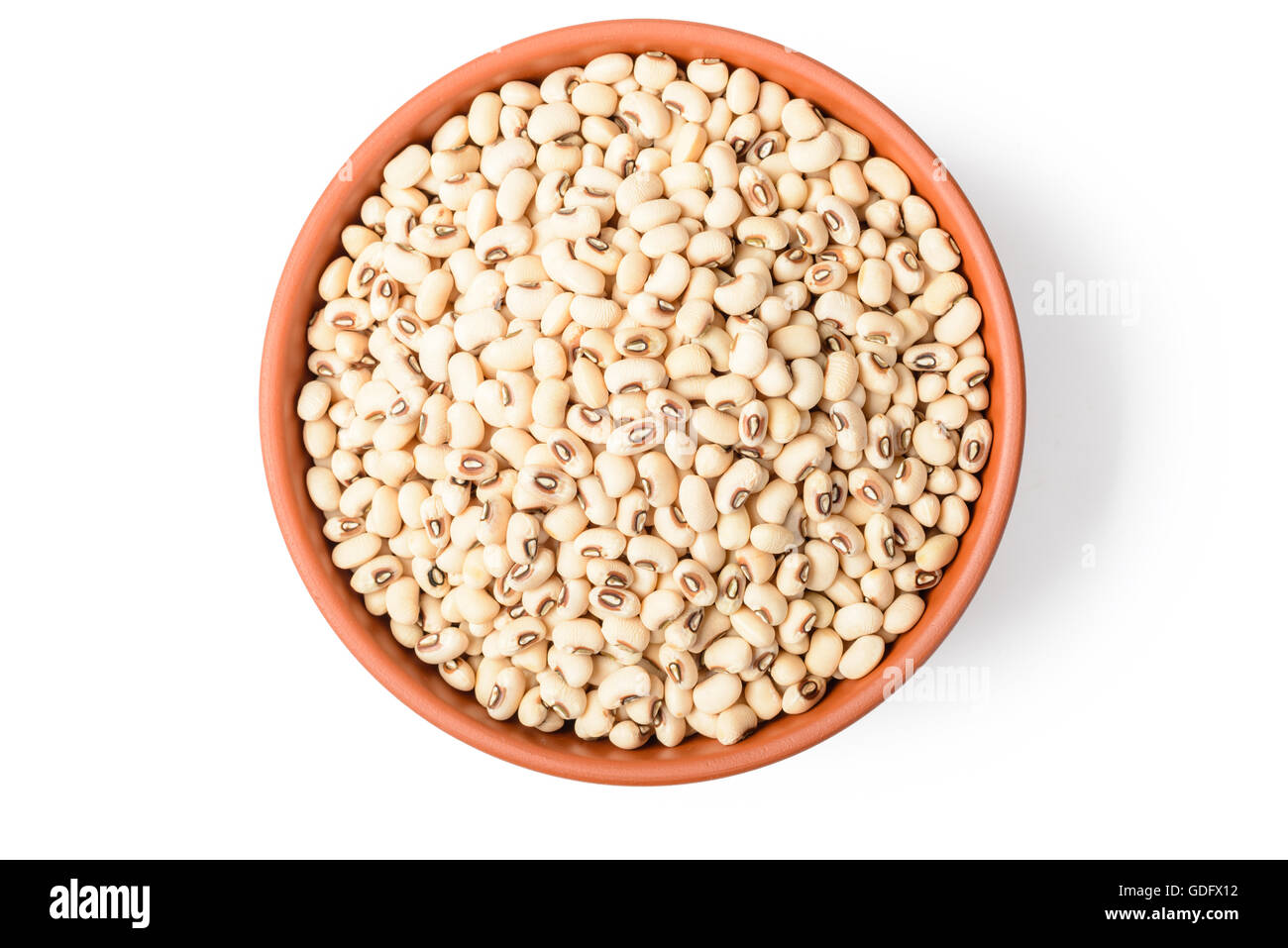 uncooked white cow pea beans in the bowl. top view Stock Photo - Alamy