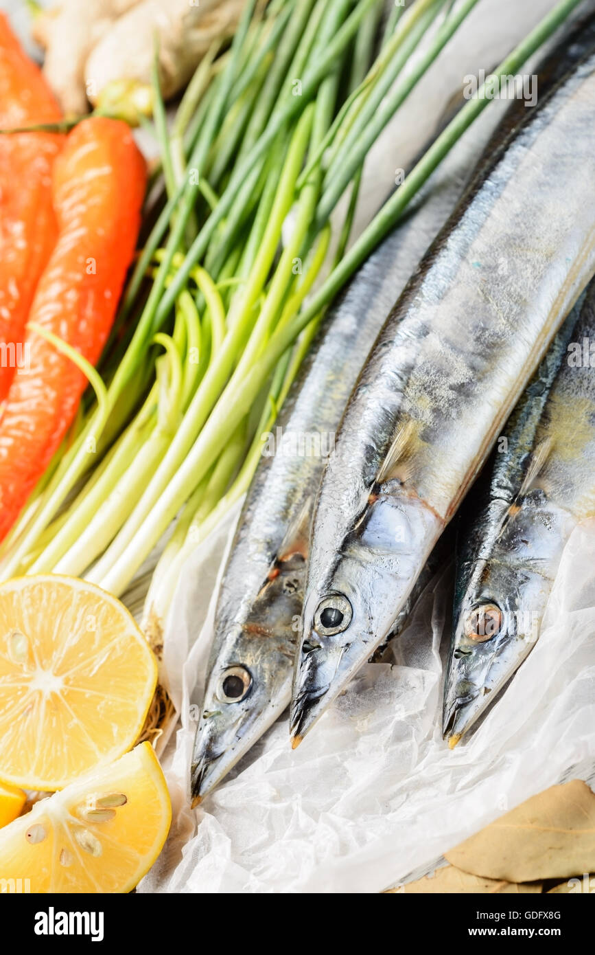 saury fish and vegetable Stock Photo - Alamy