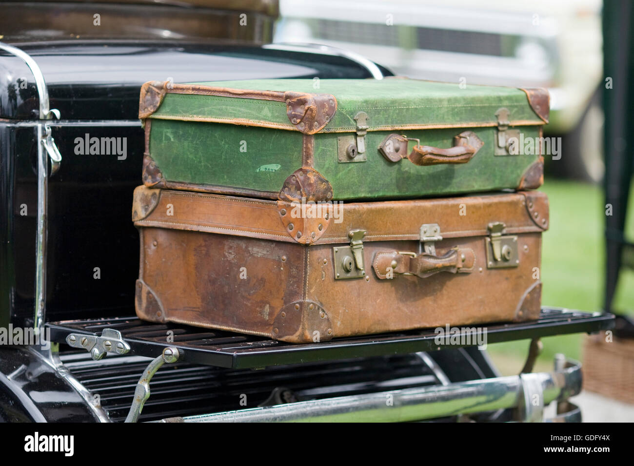 Old Retro cases on a rack Stock Photo - Alamy
