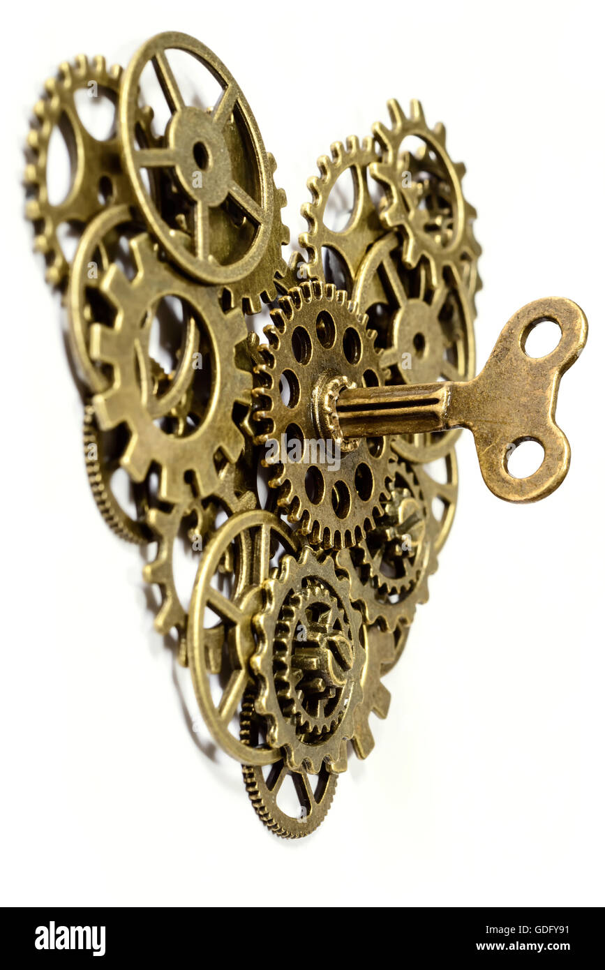 gear heart with key on white Stock Photo - Alamy