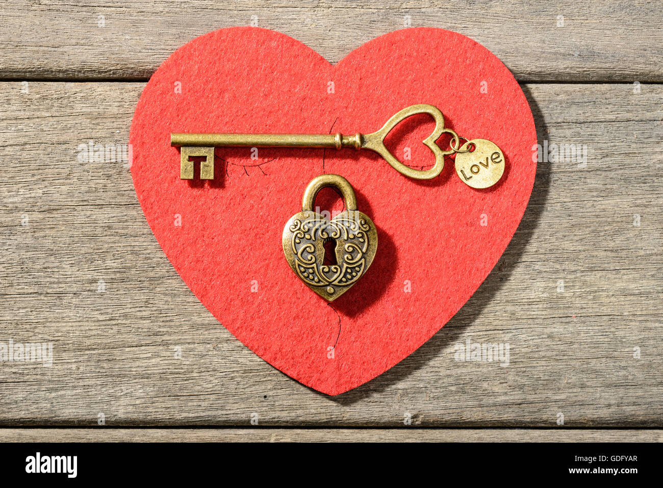 bronze heart shape lock and key Stock Photo - Alamy