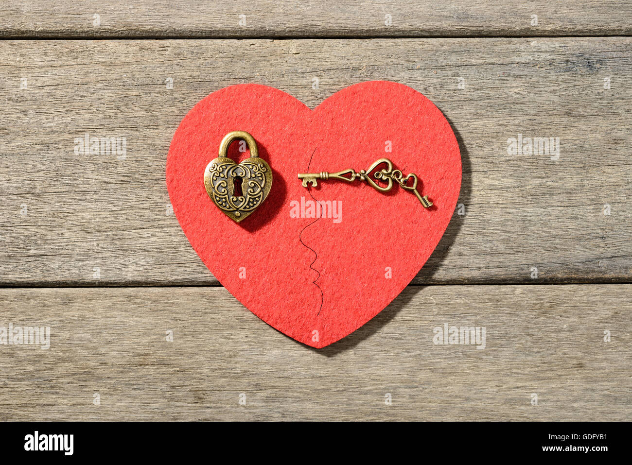 bronze heart shape lock and key Stock Photo - Alamy