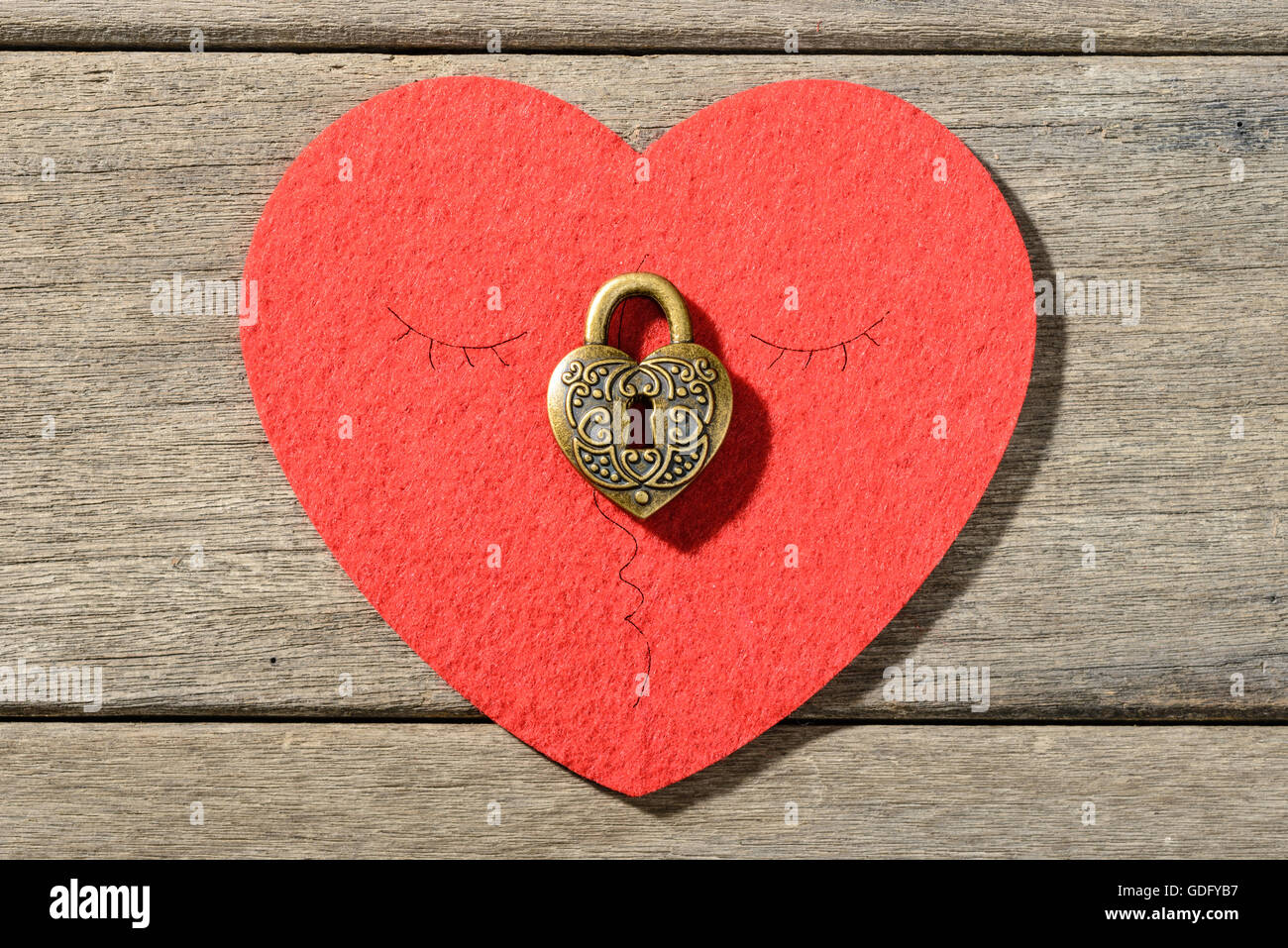 bronze heart shape lock Stock Photo - Alamy