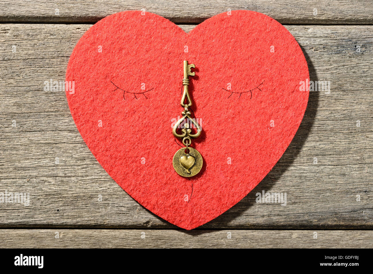 red heart and key Stock Photo - Alamy