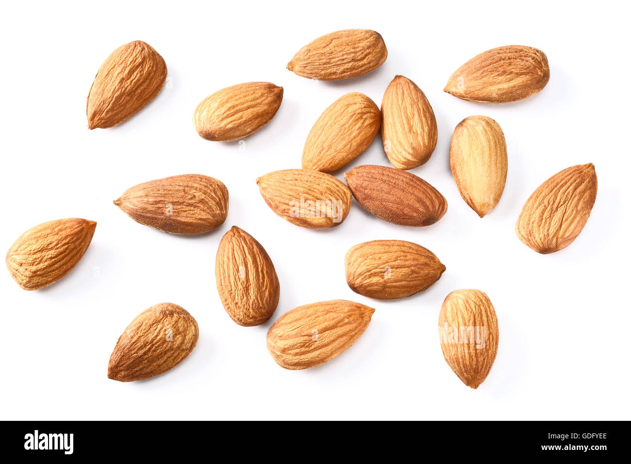 dried almond nuts on the white background Stock Photo - Alamy