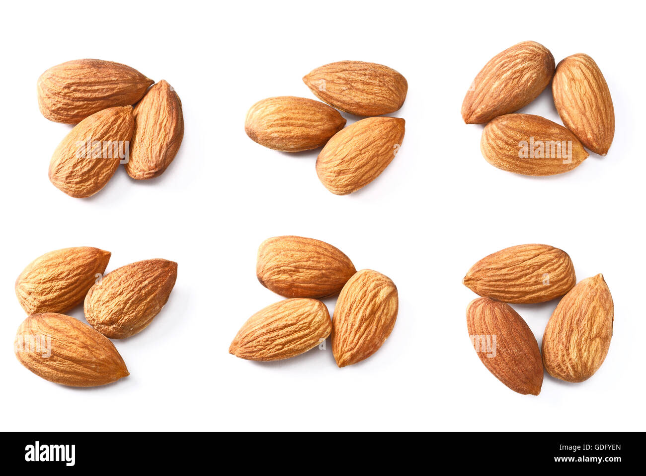 dried almond nuts on the white background Stock Photo - Alamy