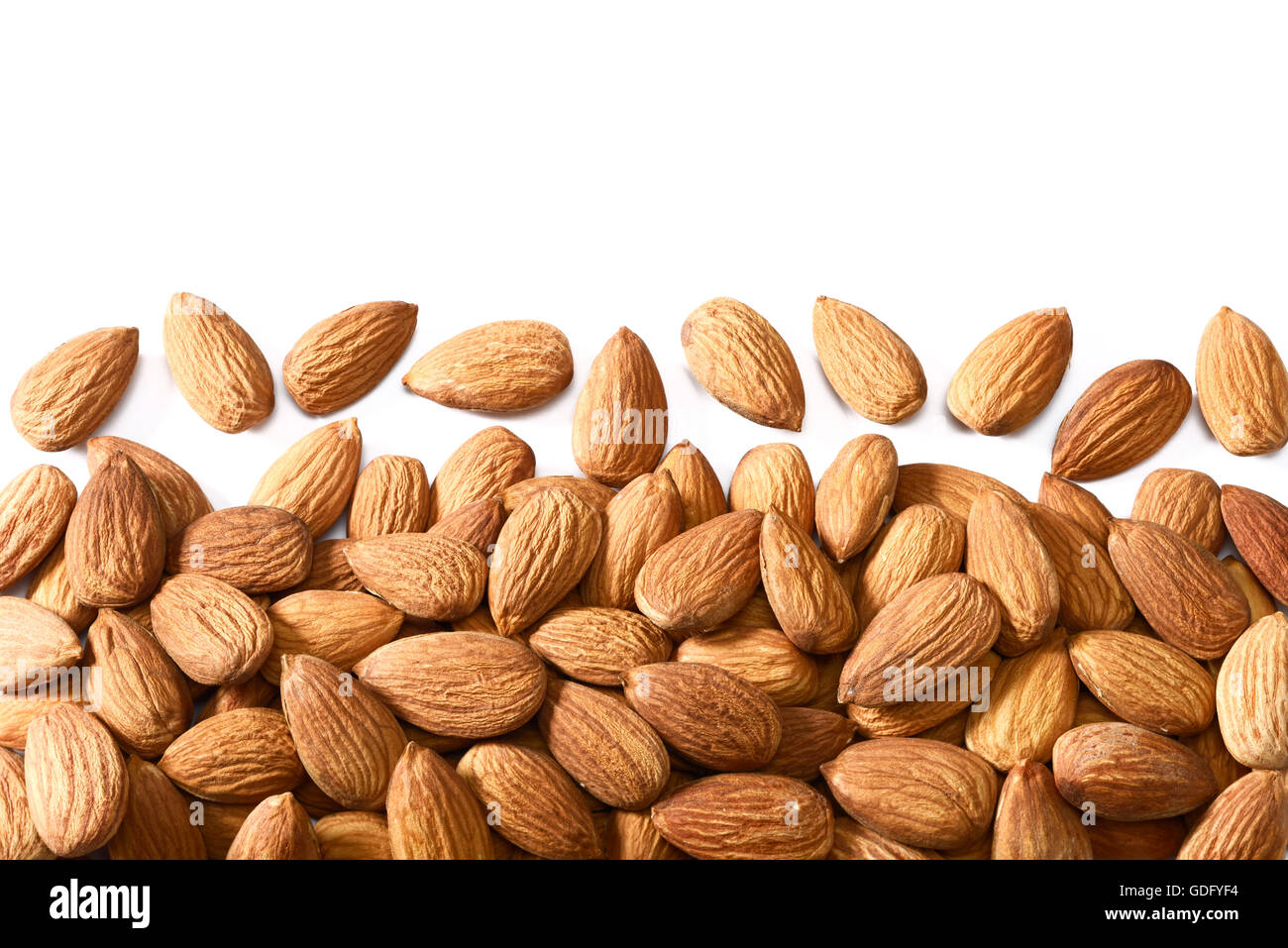 dried almond nuts on the white background Stock Photo - Alamy