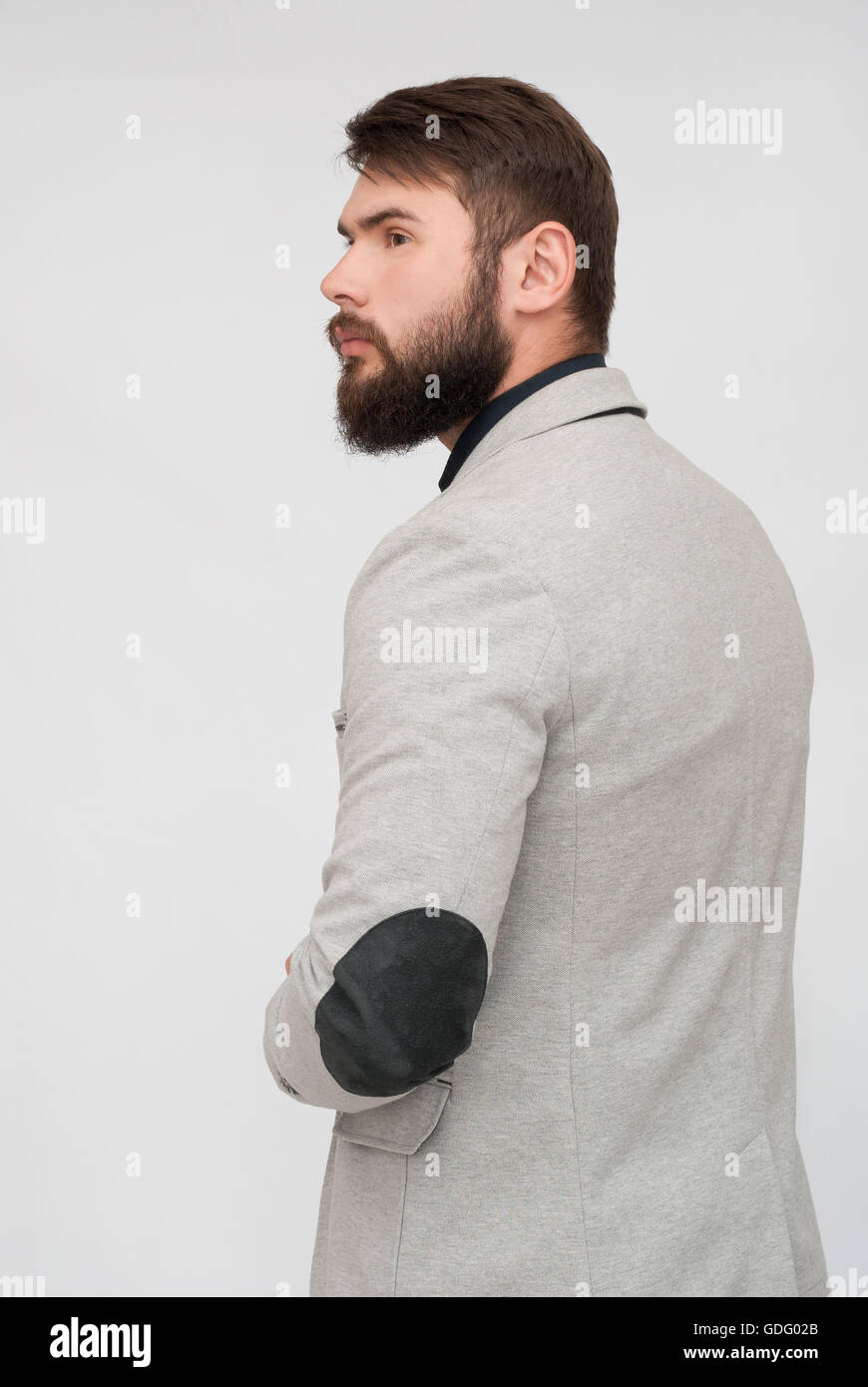 Back pose smart young guy hi-res stock photography and images - Alamy