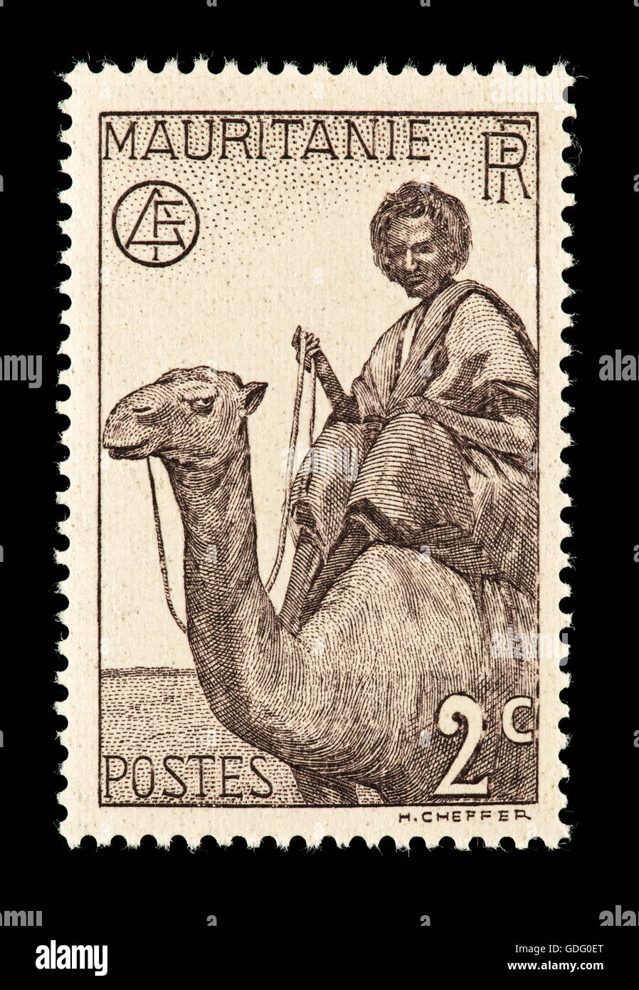 Postage stamp from Mauritania depicting a camel rider Stock Photo - Alamy