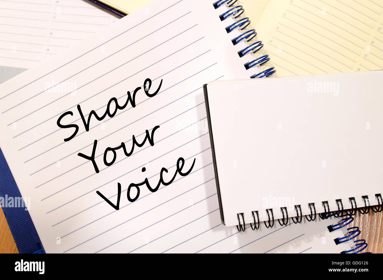Share your voice text concept write on notebook Stock Photo - Alamy
