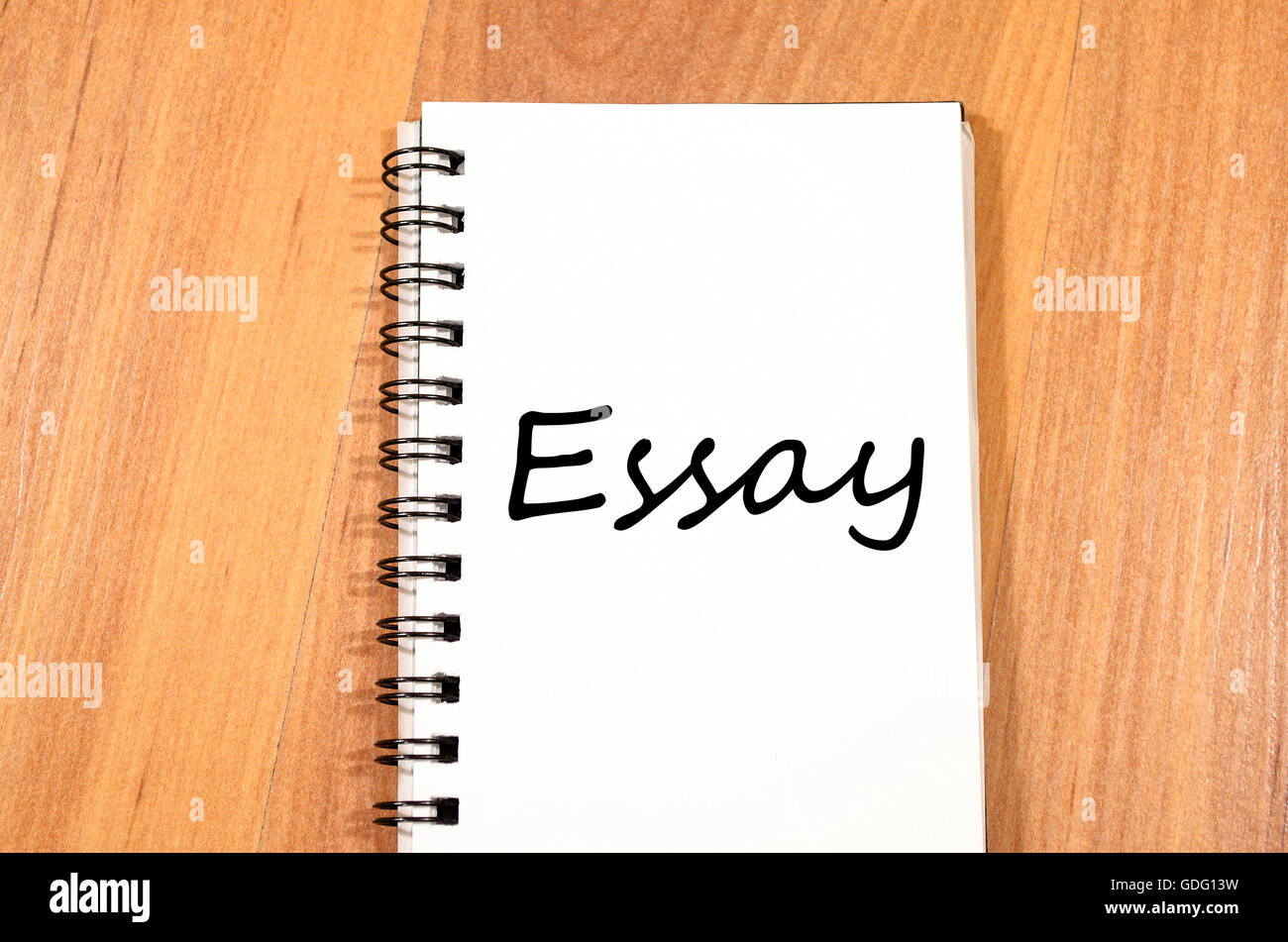 Essay text concept write on notebook Stock Photo - Alamy