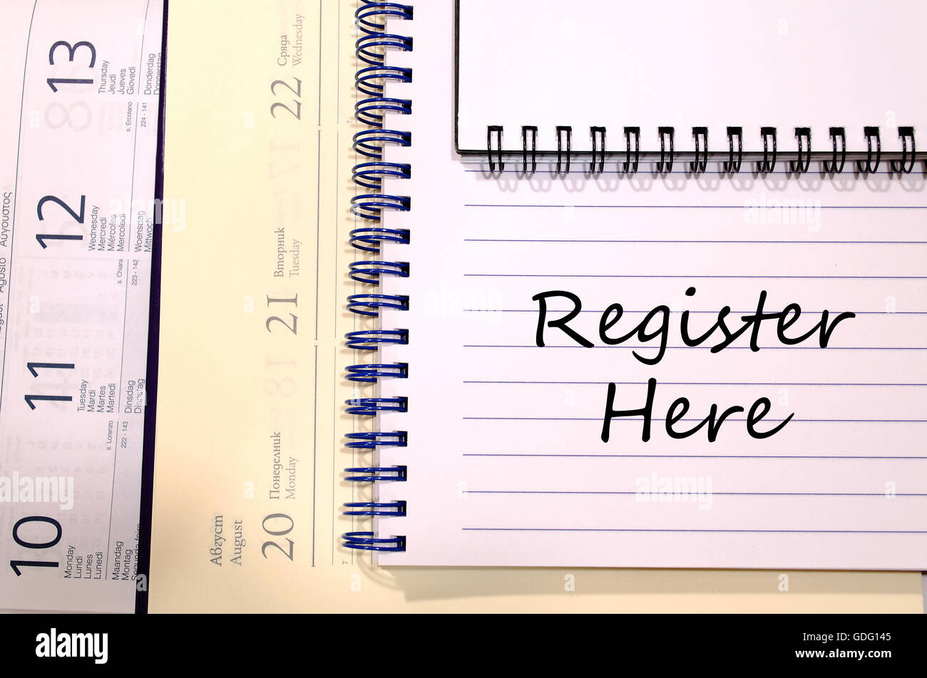 Register here text concept write on notebook Stock Photo - Alamy