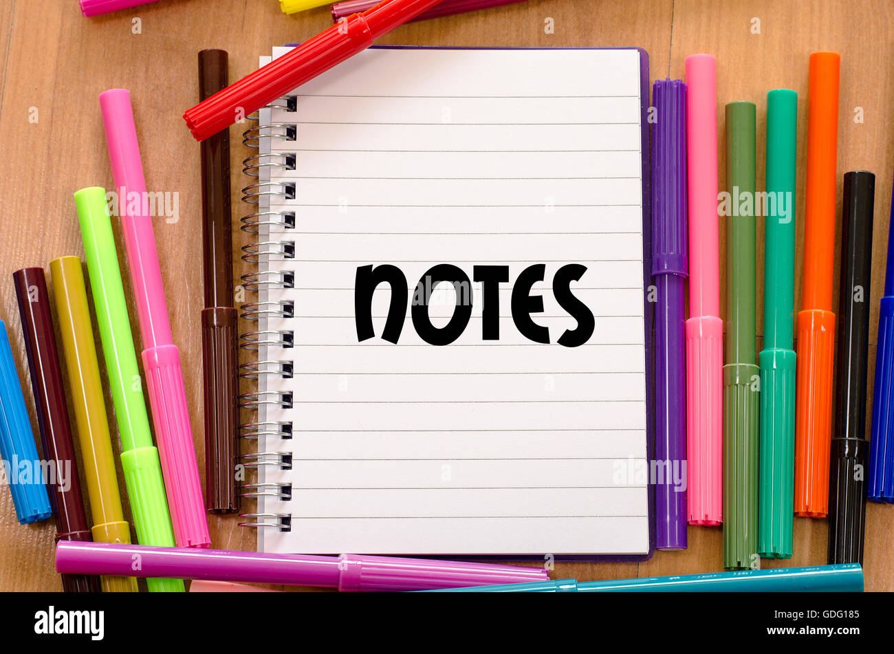 Notes written on whiteboard over wooden background Stock Photo - Alamy