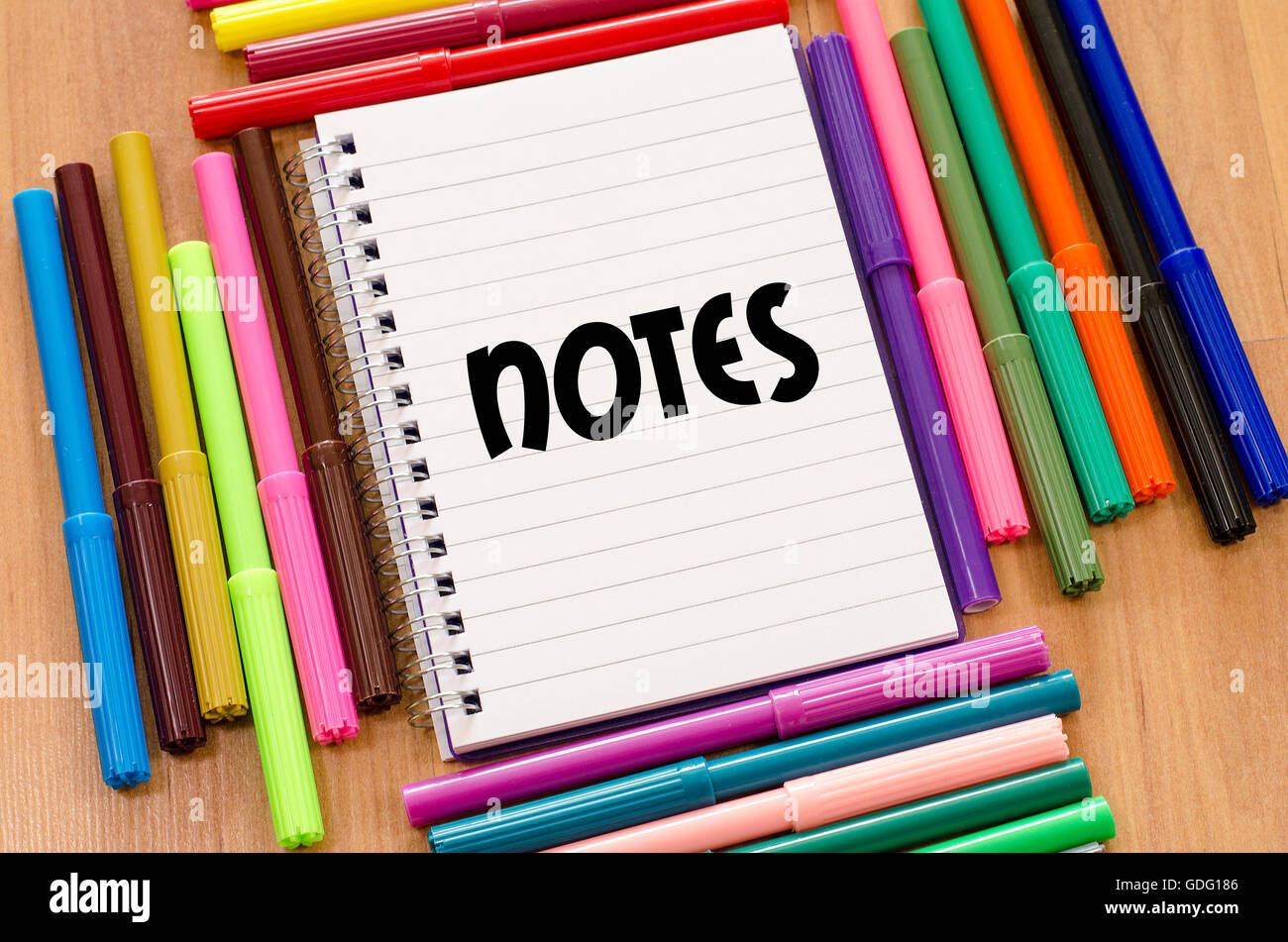 Notes written on whiteboard over wooden background Stock Photo - Alamy