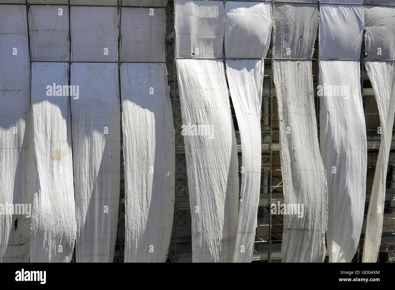 dust cover on the facade of a building under renovation Stock Photo - Alamy