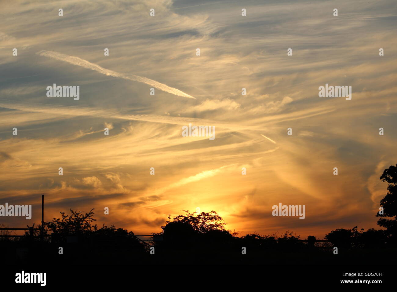 Sun begins set over hi-res stock photography and images - Alamy