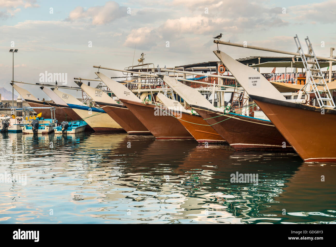 Fishing boats in harbour musandam hi-res stock photography and images ...